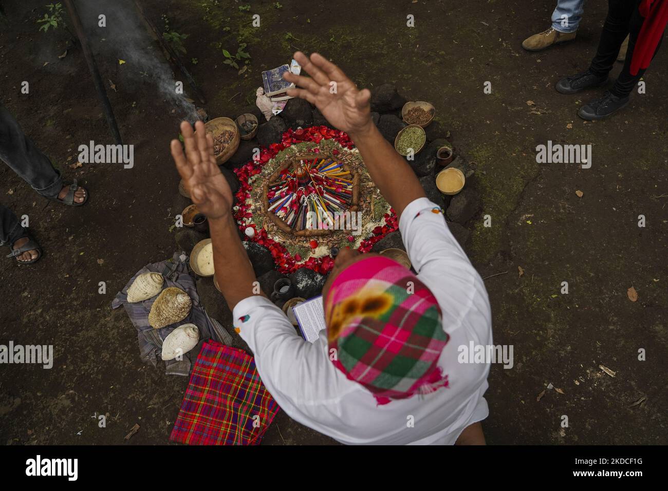 Tata Cuyut, a Pipil priest performs a ritual during a summer solstice ...