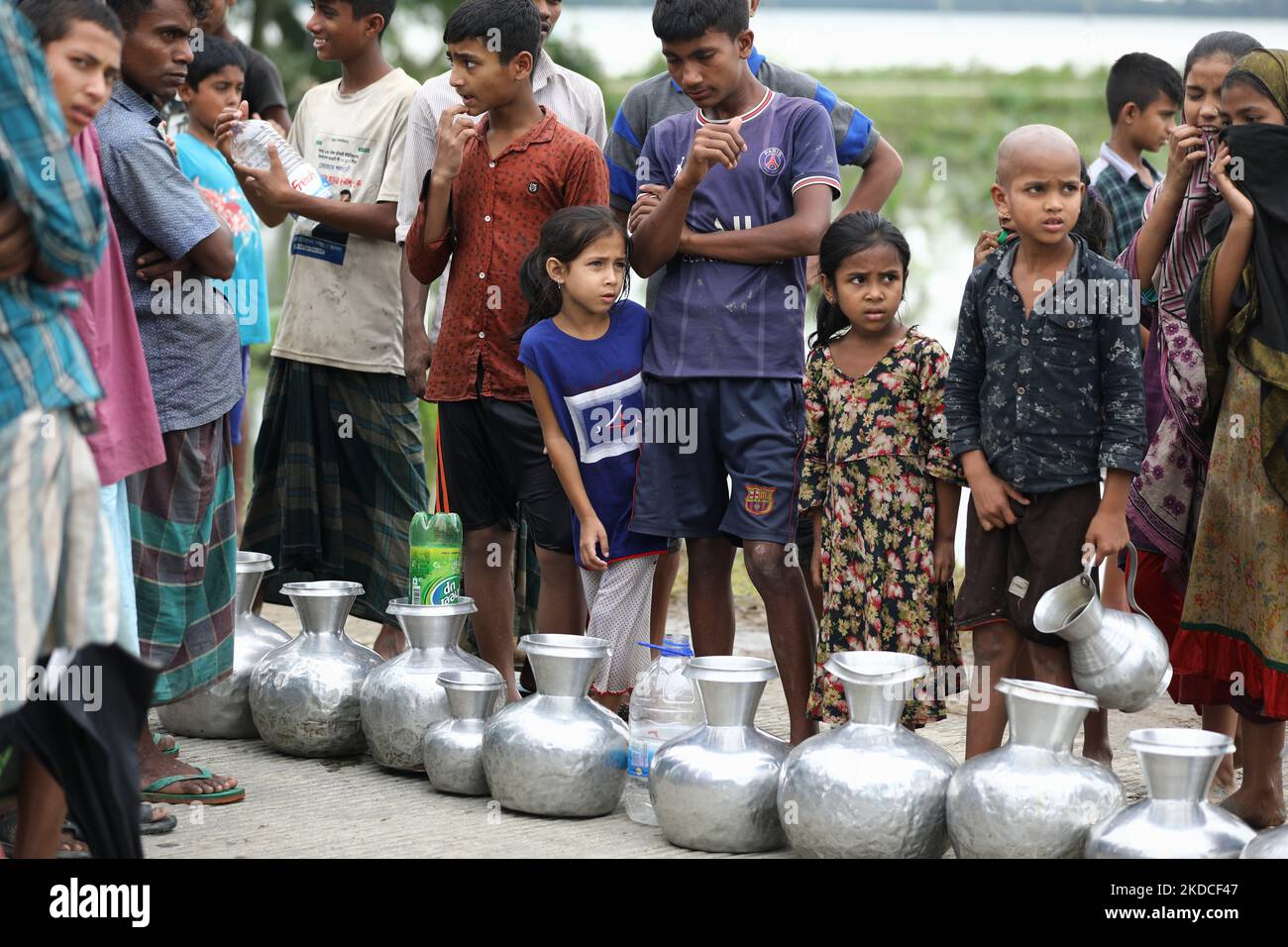 Children in flooded area hi-res stock photography and images - Alamy