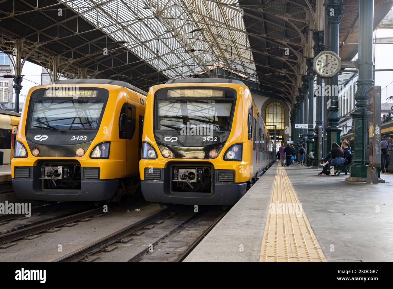 People await for the arrival of a train of the Comboios de Portugal ...