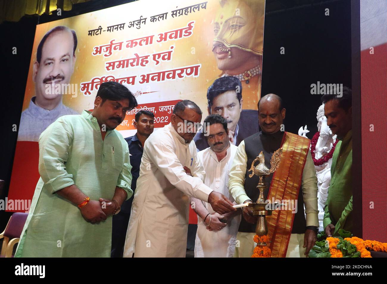 Lok Sabha Speaker Om Birla with RSS leader Nimba Ram lighting the lamp ...