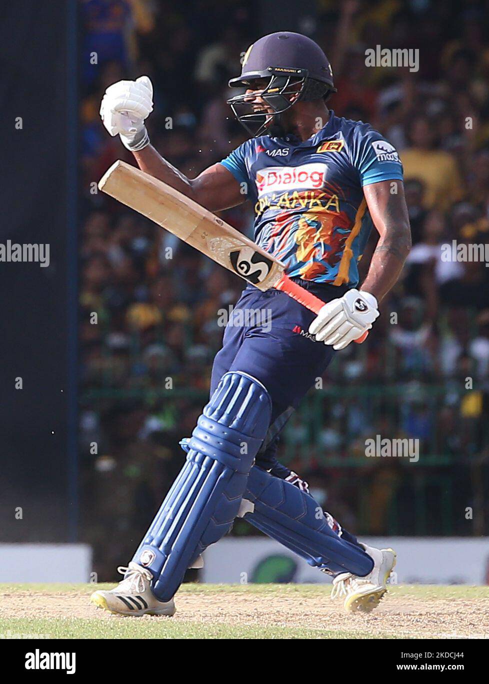 Sri Lanka's Chamika Karunaratne celebrates after scoring a half-century ...