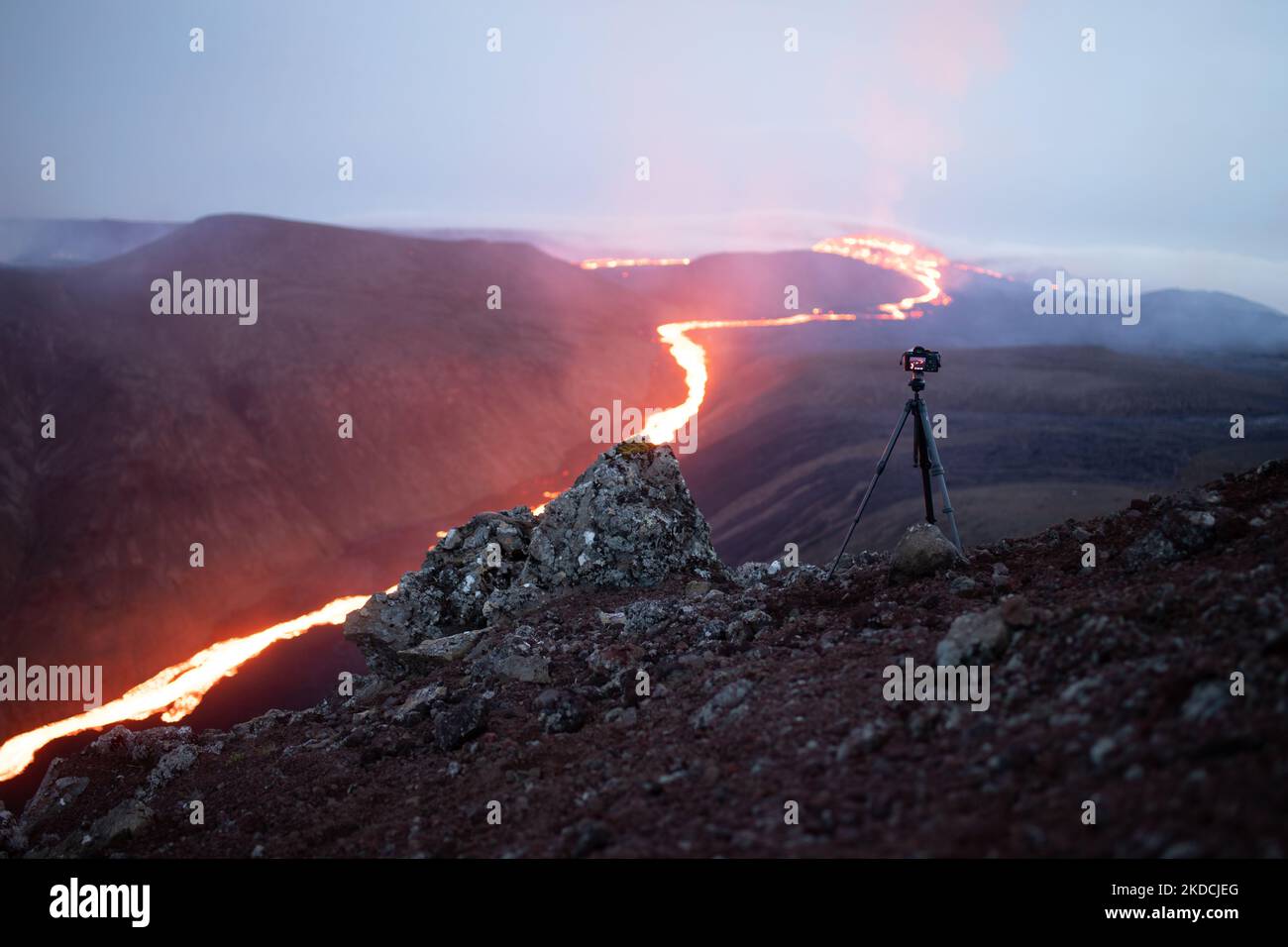 A scenic aerial shot of the erupting Fagradalsfjall volcano in Iceland ...