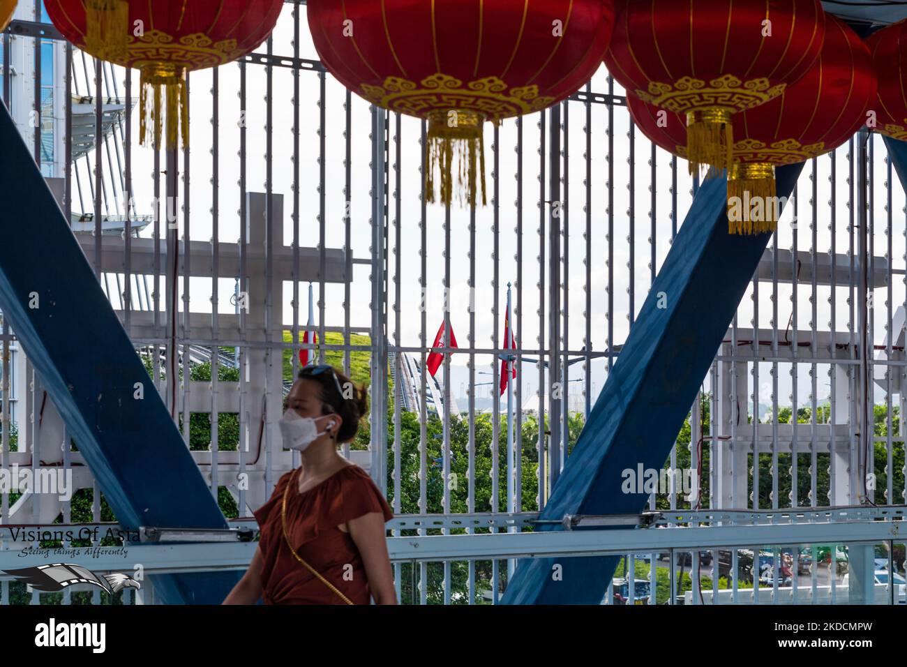 The Chinese and Hong Kong flags can be seen behind bars on an elevated ...