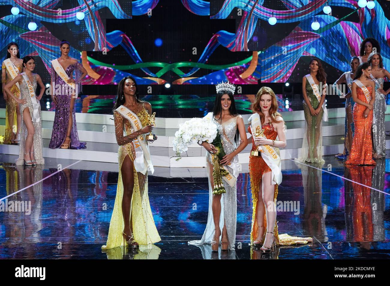 Winner Miss Philippines Fuschia Anne Ravena (C) is flanked by first ...