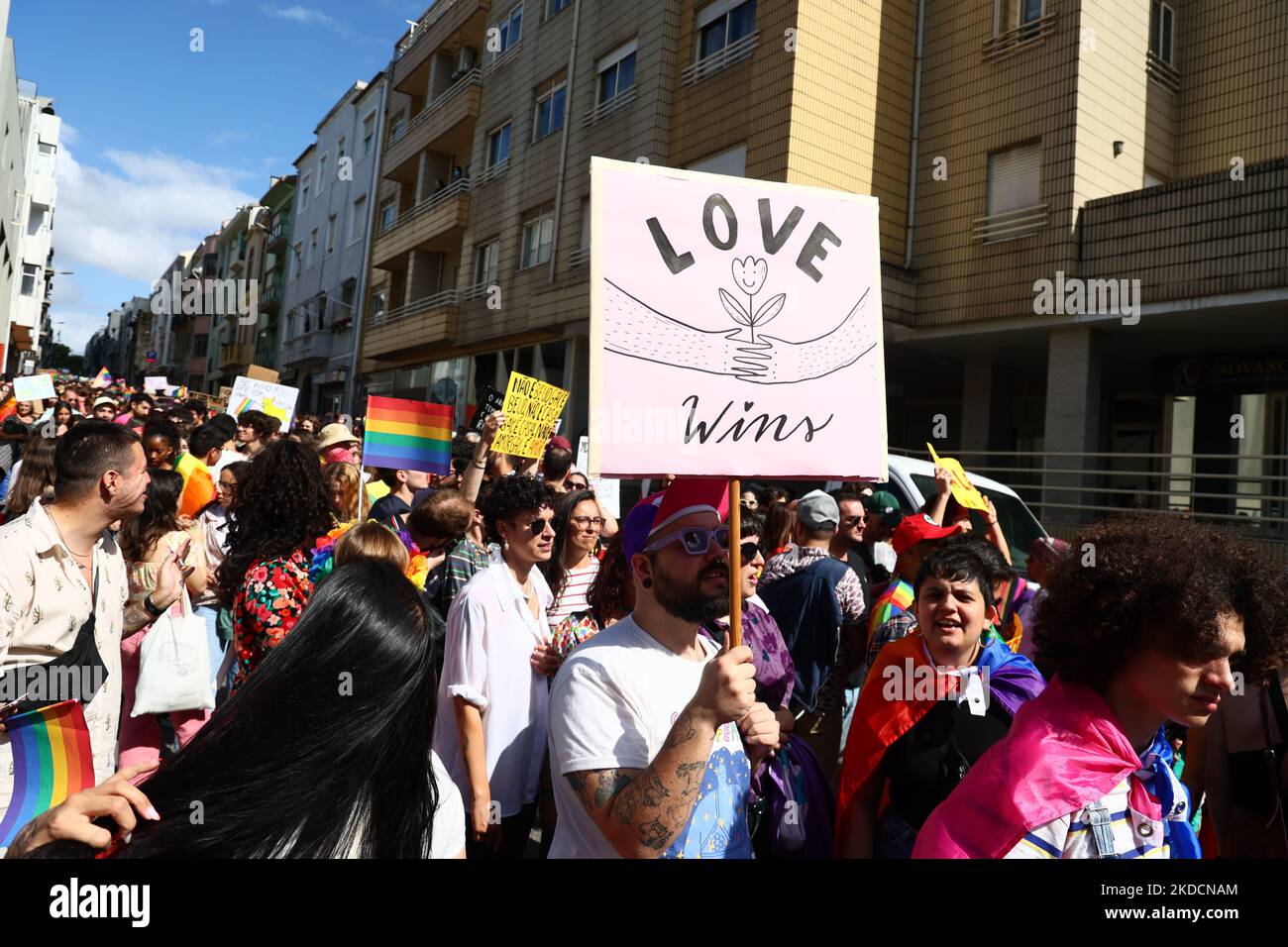 People attend the Marcha Do Orgulho LGBTI+ (Pride March) 2022 in Porto ...