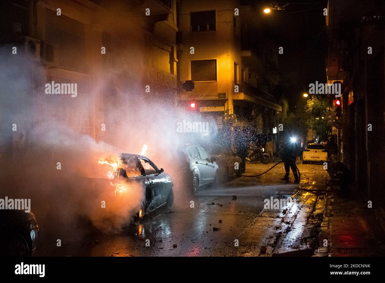 A car is burning after a protest against the Subway station that the ...