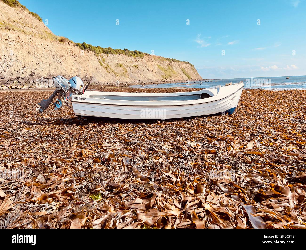 Boat on beach at Robin Hood's Bay, North Yorkshire Stock Photo - Alamy