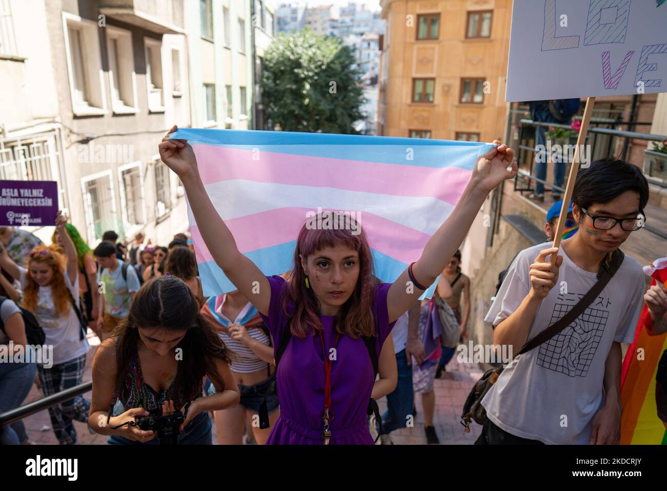 People march during the LGBTQ Pride March in Istanbul, Turkey, Sunday ...