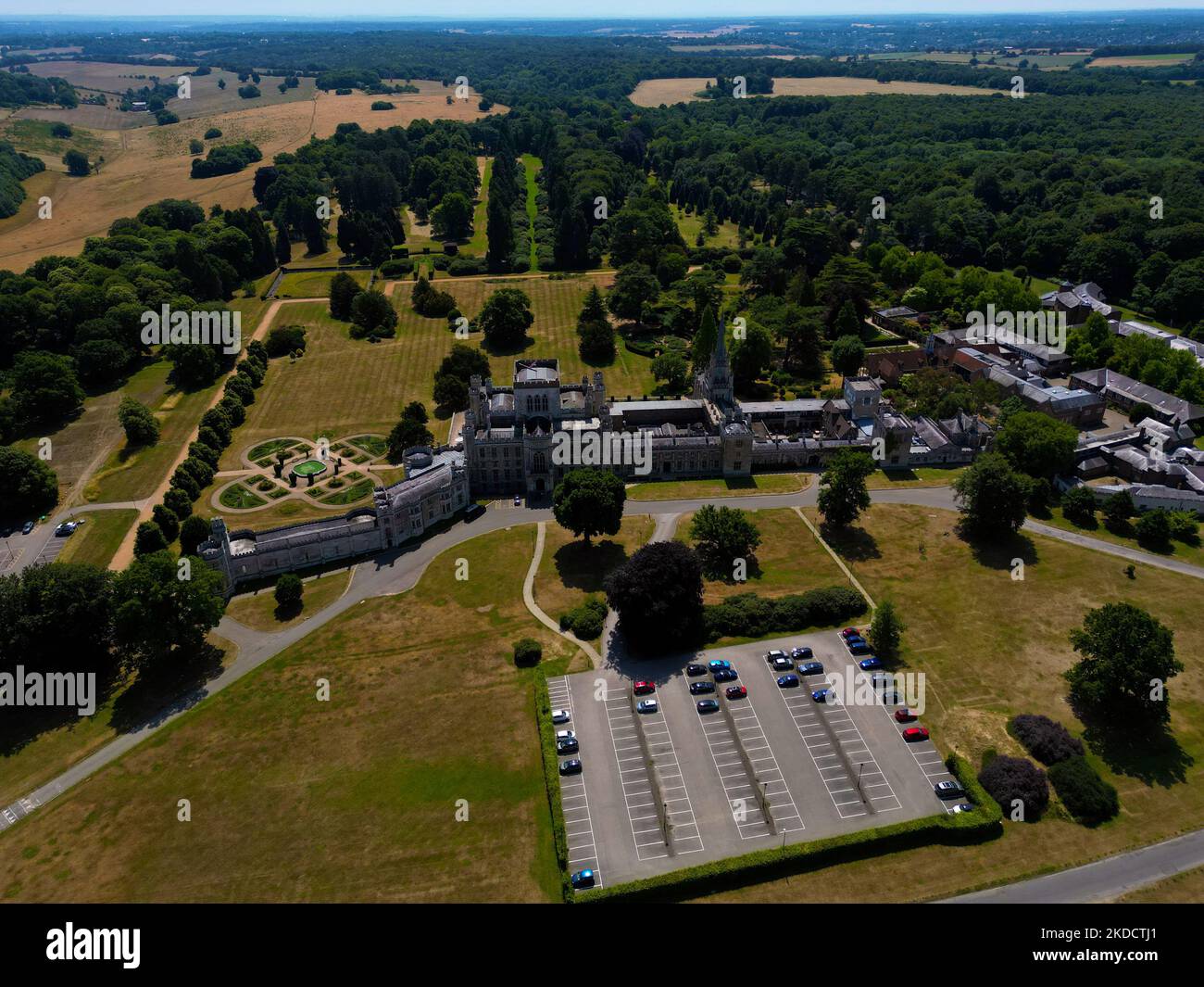 A bird's eye view of the Ashridge House surrounded by trees and fields ...