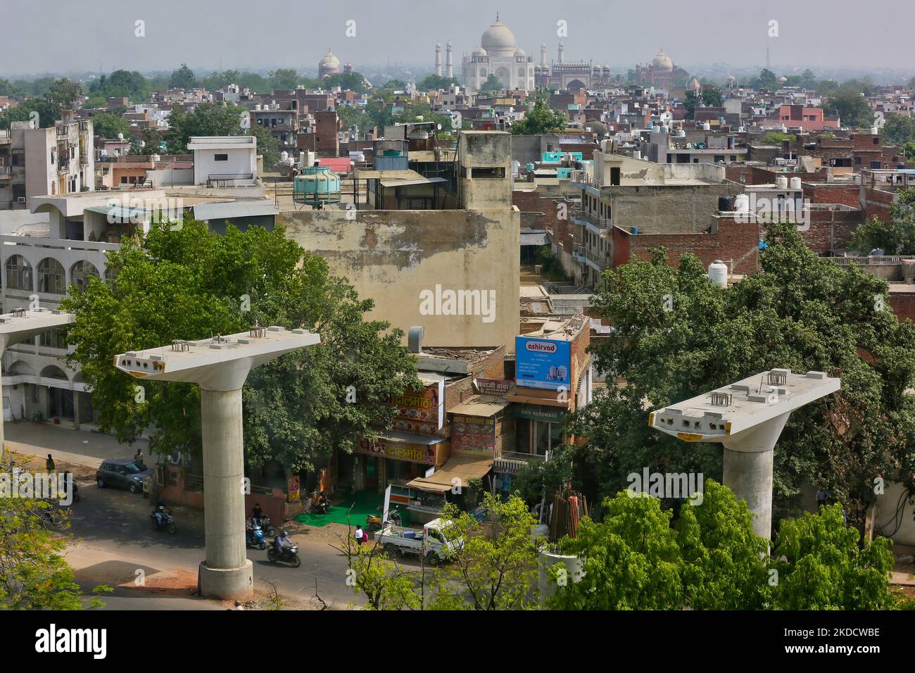 Cement pillars are seen during construction of the Agra Metro project ...