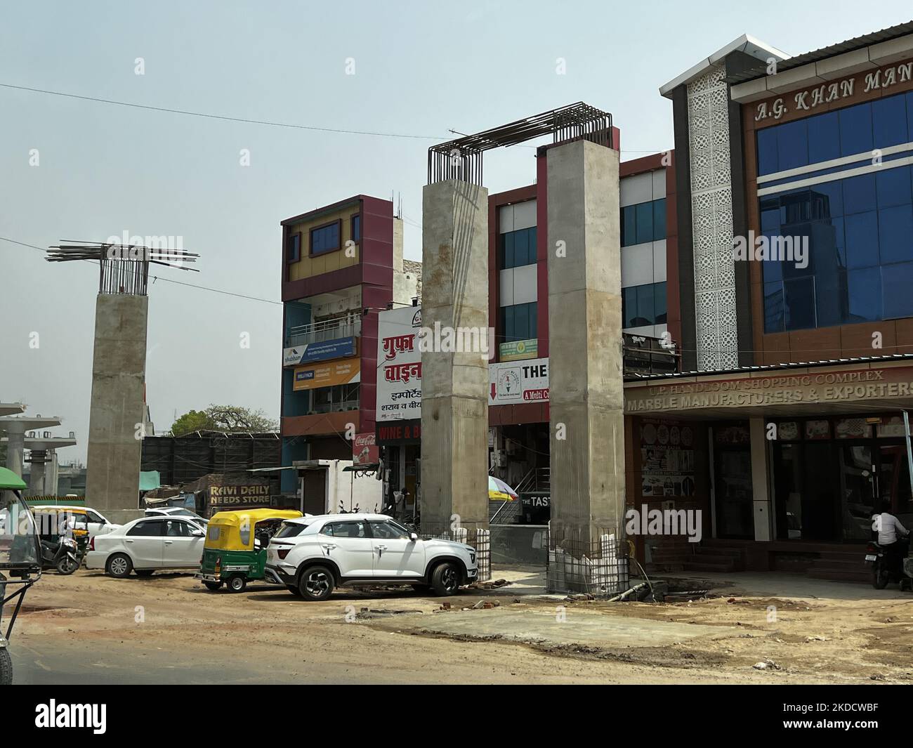 Cement pillars are seen during construction of the Agra Metro project ...