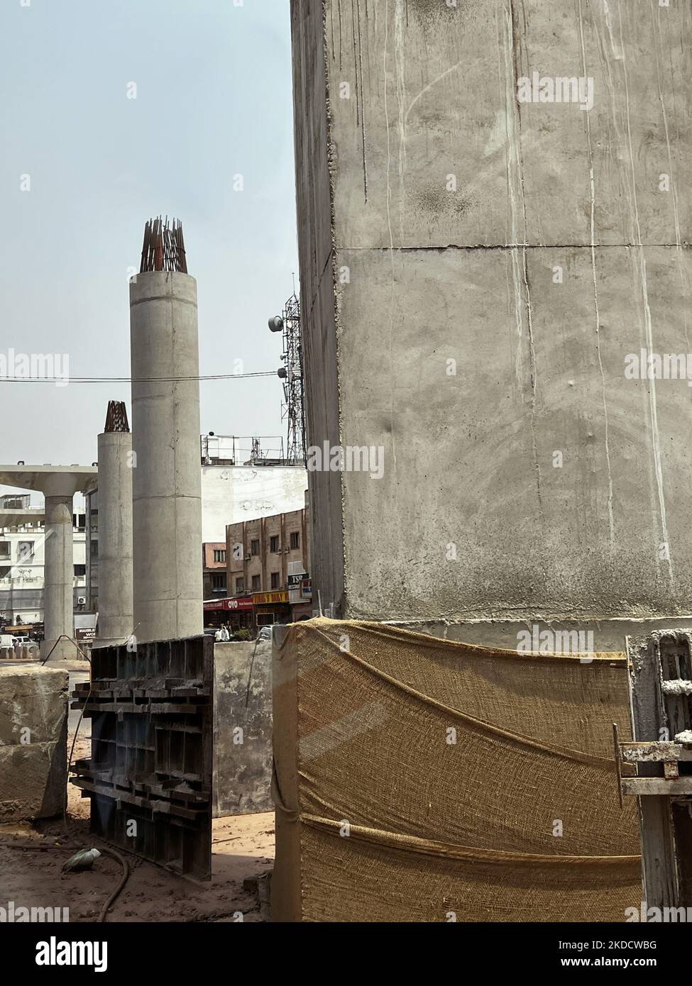 Cement pillars are seen during construction of the Agra Metro project ...