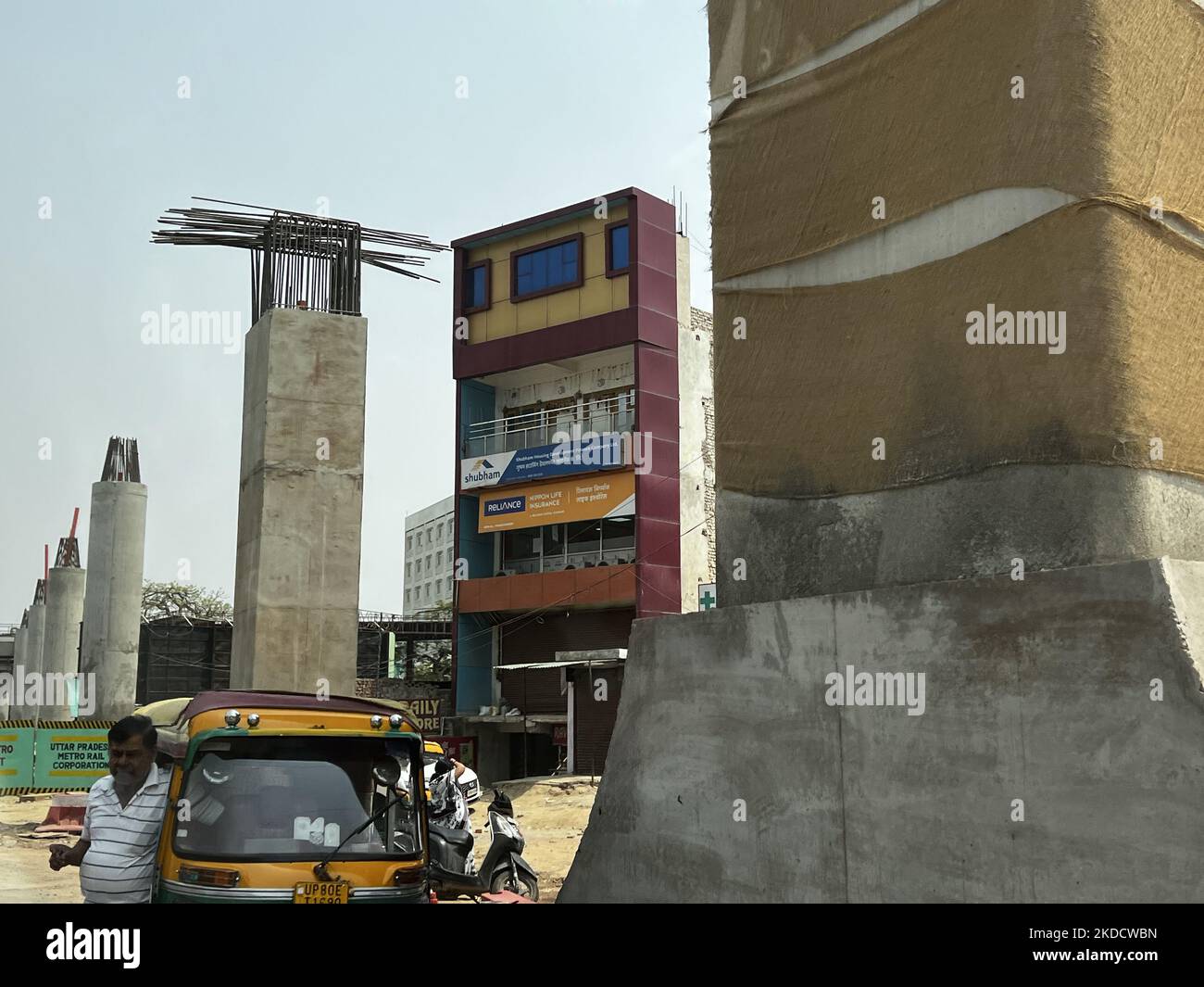 Cement pillars are seen during construction of the Agra Metro project ...