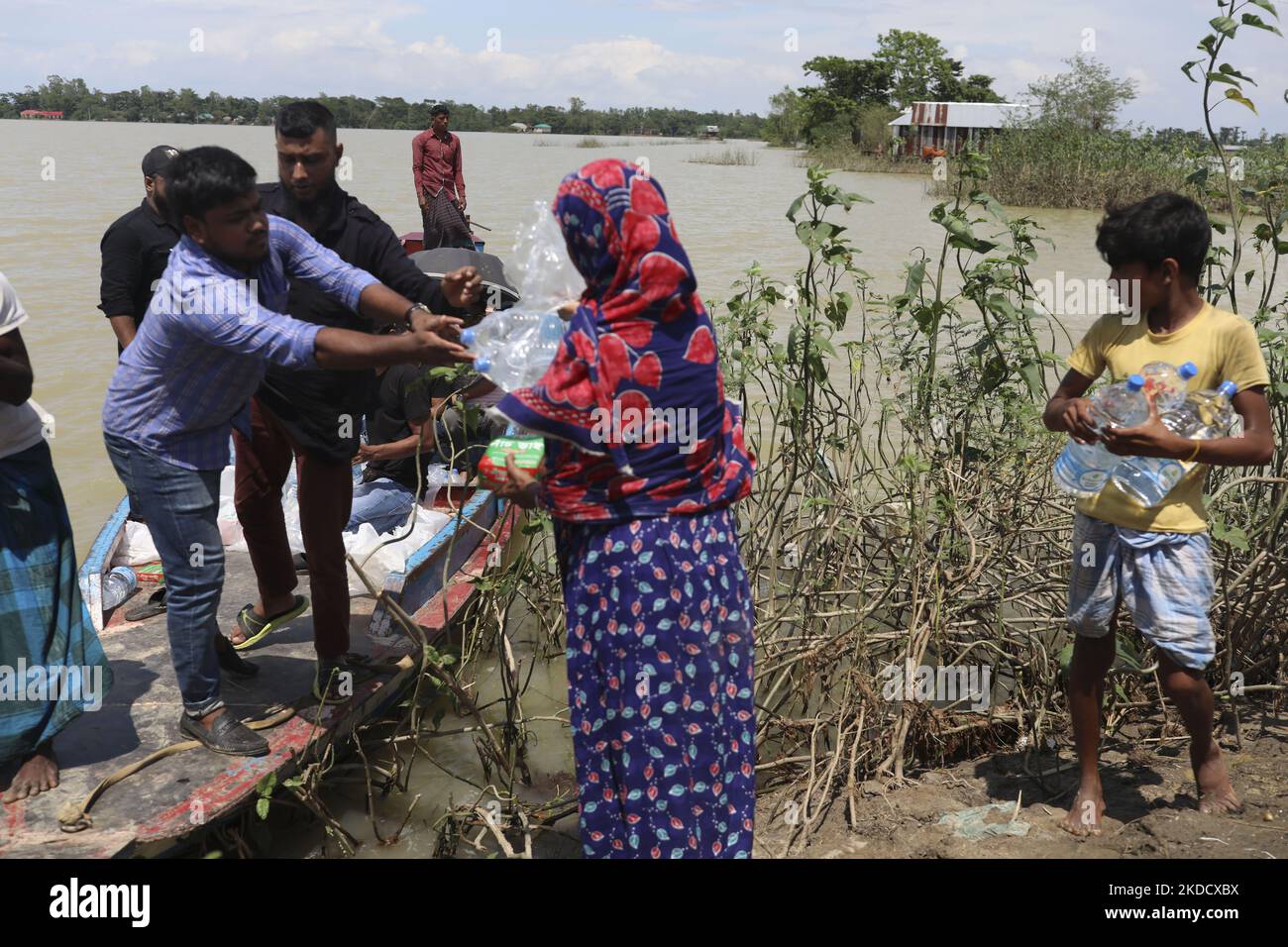 Flood affected people back to their house and try to fixes their house ...