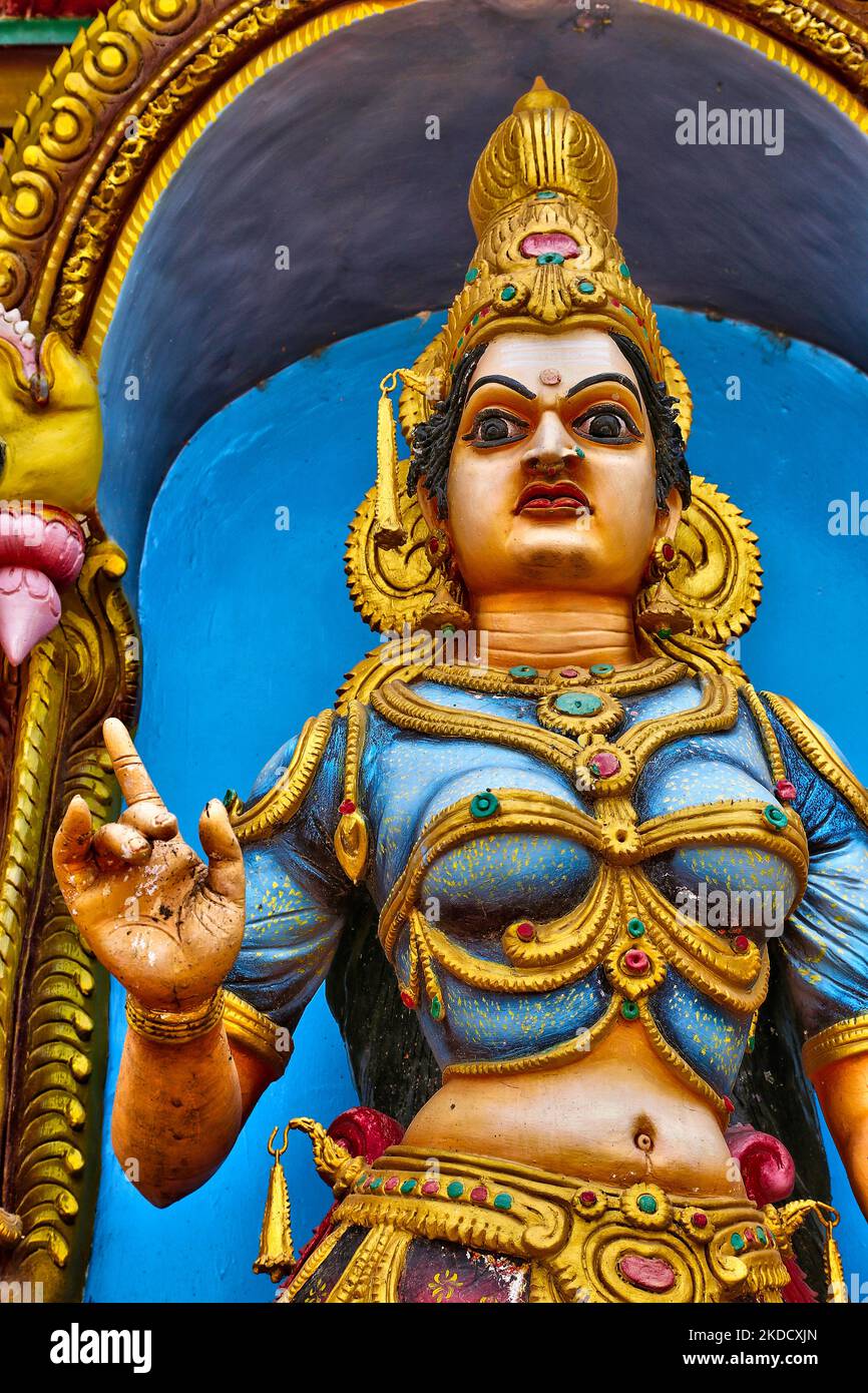 Statue of a female guardian deity at the entrance of the at the ...