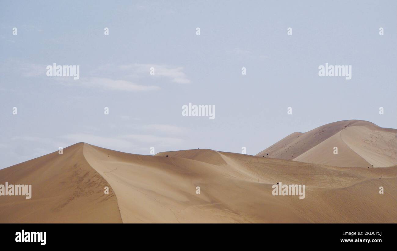 A low-angle of sunlit hills in the horizon, clear sky background Stock ...