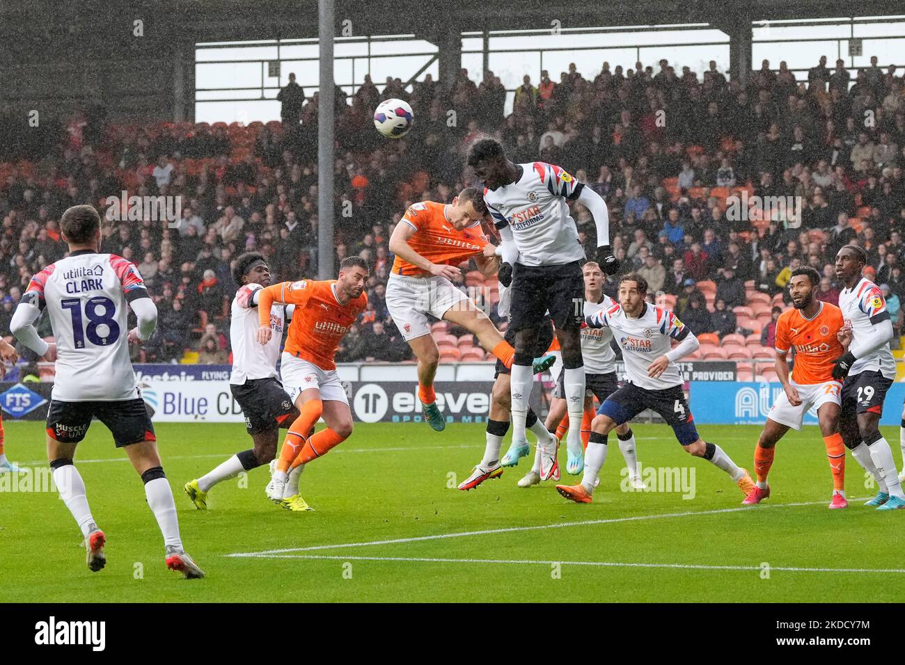 Elijah Adebayo #11 of Luton Town heads clear under pressure from Callum ...