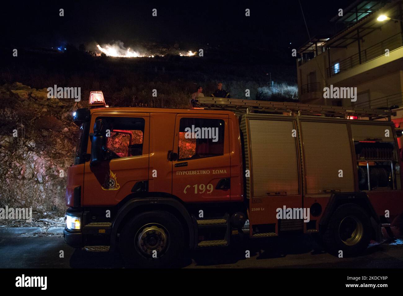 A sudden wildfire broke out at night at the suburbs of Athens, at ...