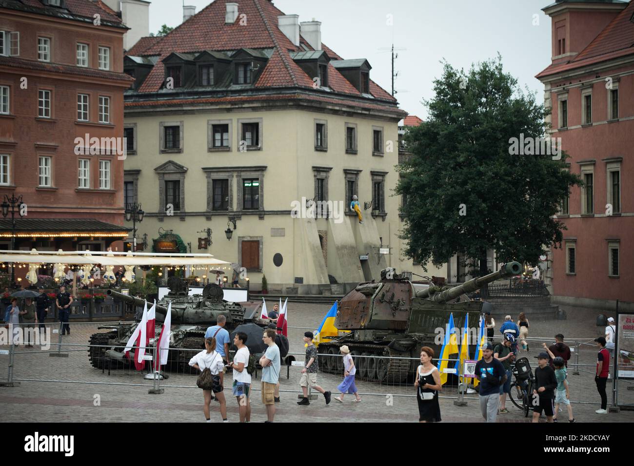 Russian tanks are seen in display near the Royal Castle in Warsaw ...