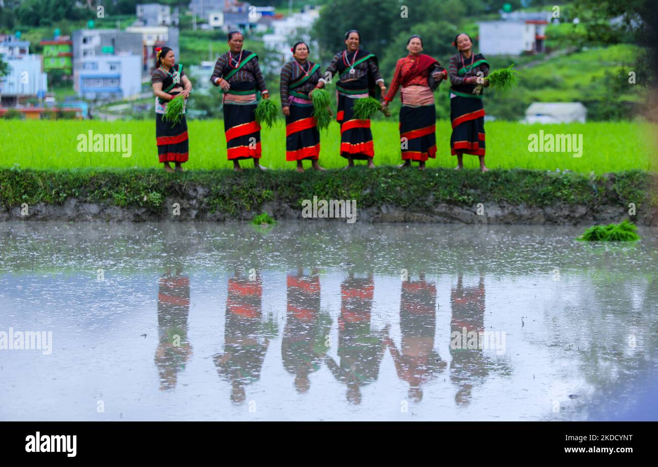 Women in traditional dress sing a song as they celebrate the National ...