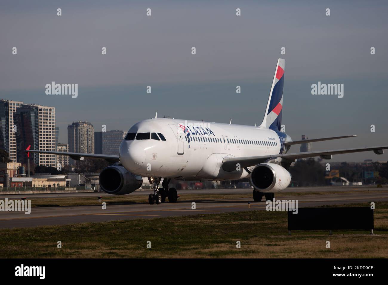 A Latam Airllines passenger lands on Jorge Newbery airport, in Buenos ...