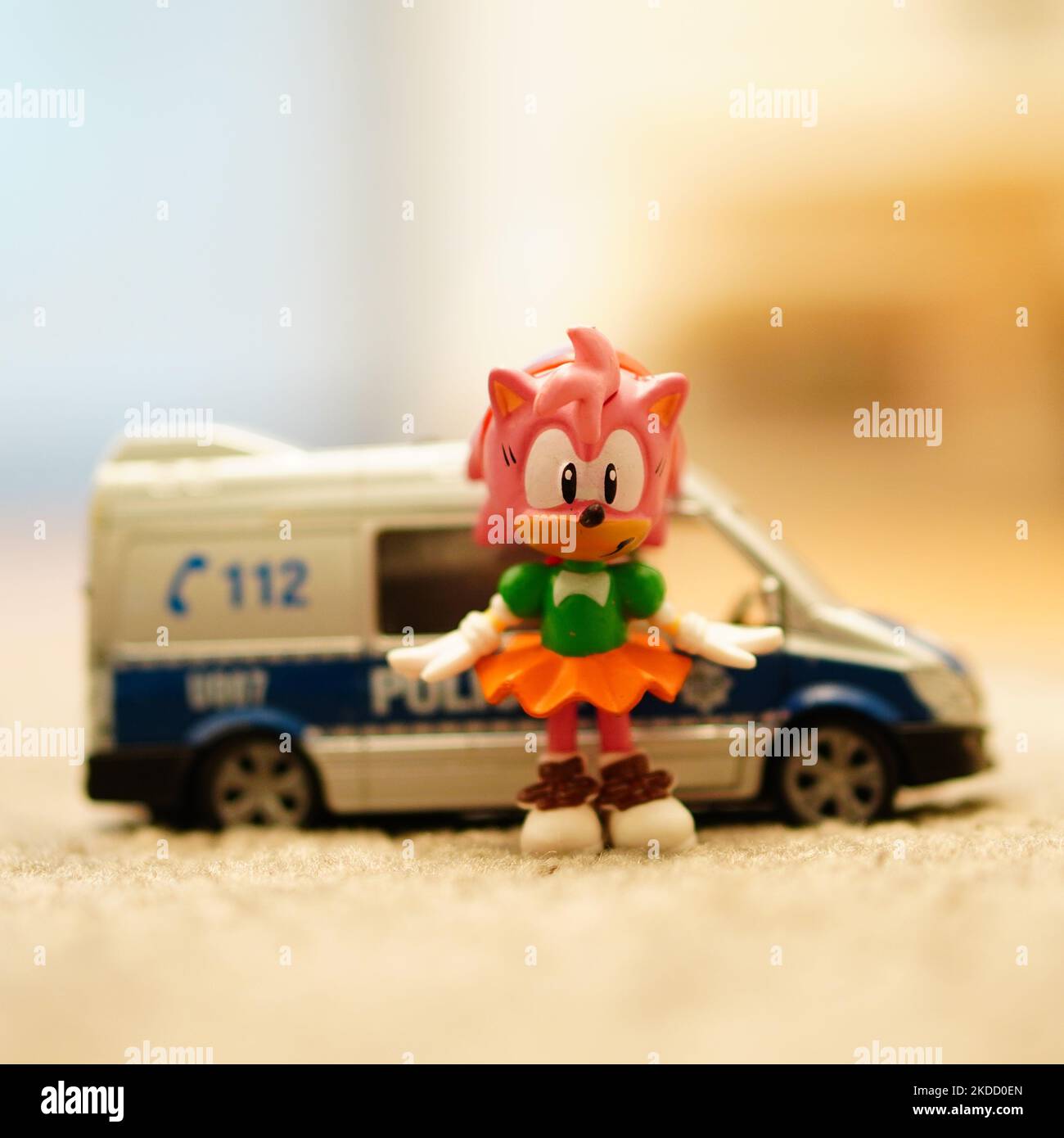 A beautiful shot of female sonic toy with a police car in the ...