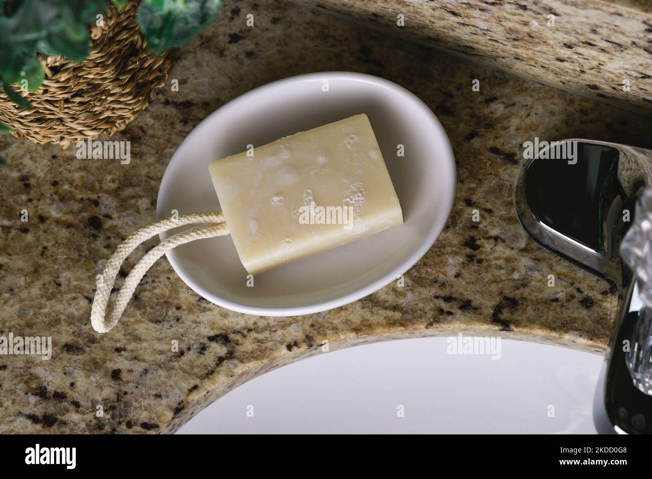 a bar of zero waste soap on white dish at bathroom sink Stock Photo - Alamy