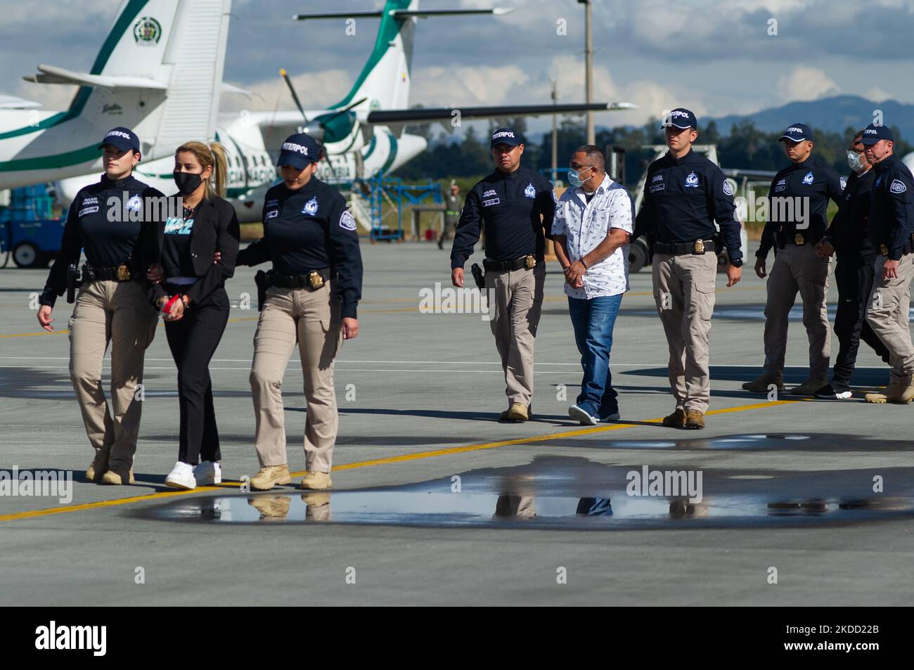 Officers of INTERPOL Police escort Nini Johana Usuga alias 'La Negra ...