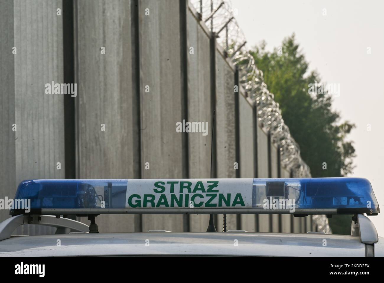Polish border guards vehicle seen near the new fence on the Polish ...