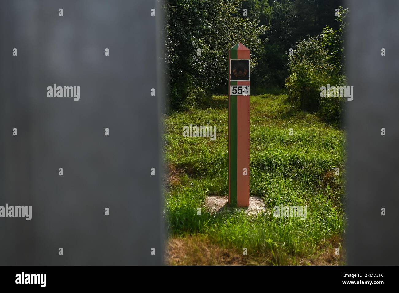 View of the Belarusian border post behind the new fence on the Polish ...