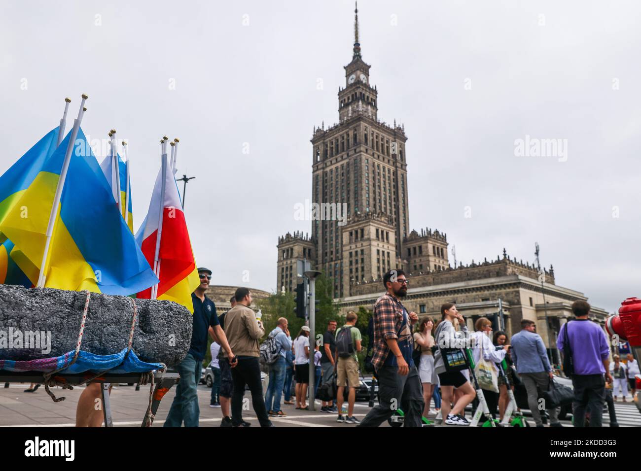 Flags of Ukraine and Poland are seen with Palace of Culture and Science ...