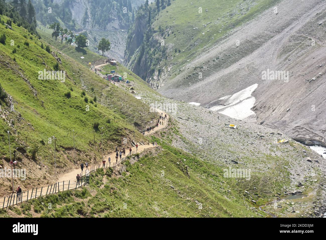 Hindu pilgrims ride horses toward the Amarnath cave during the yearly ...