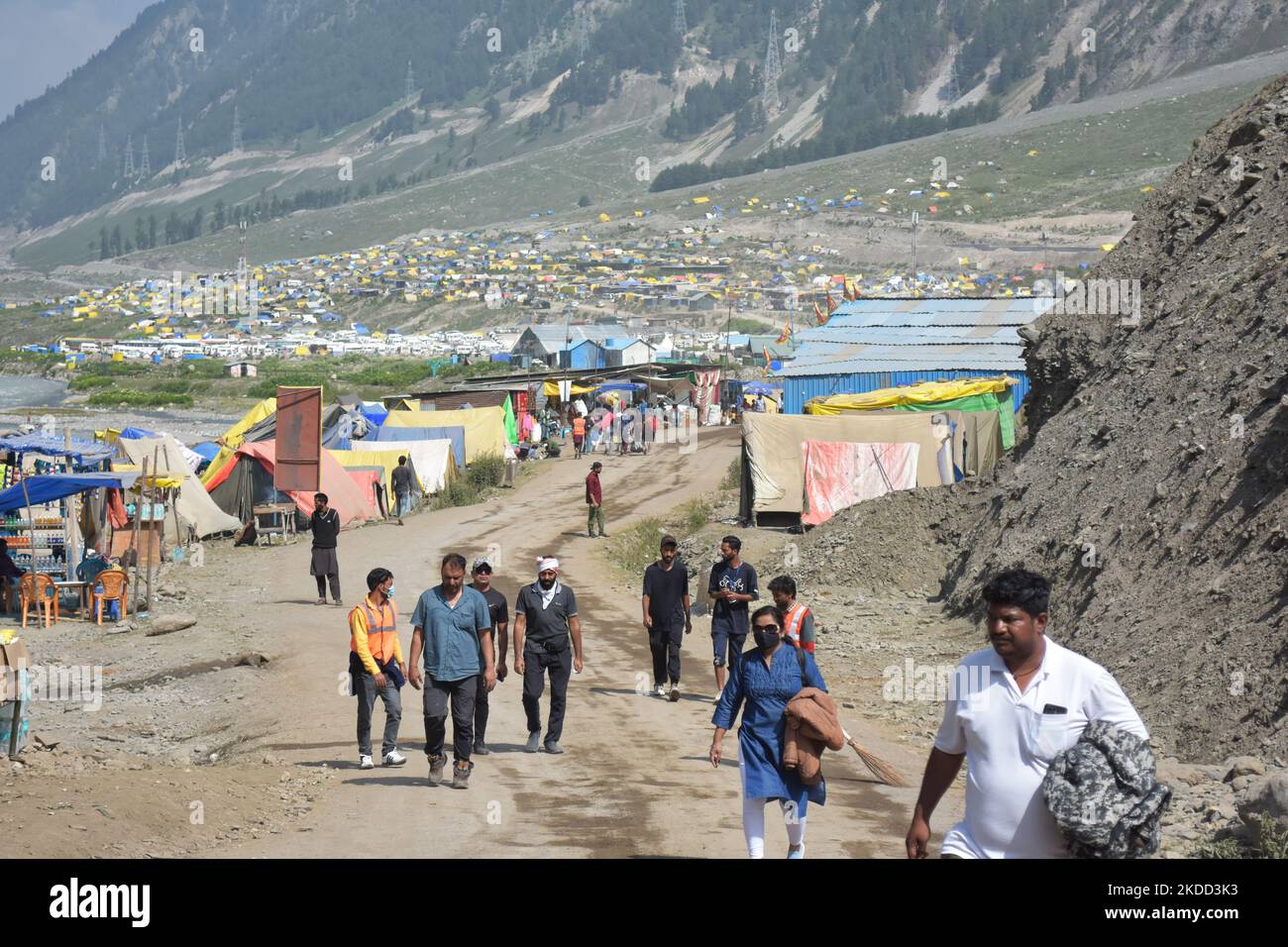 Hindu pilgrims walk toward the Amarnath cave during the yearly ...