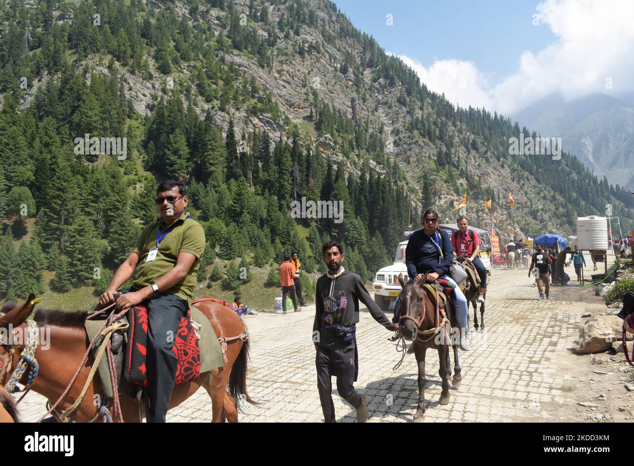 Hindu pilgrims ride horses toward the Amarnath cave during the yearly ...