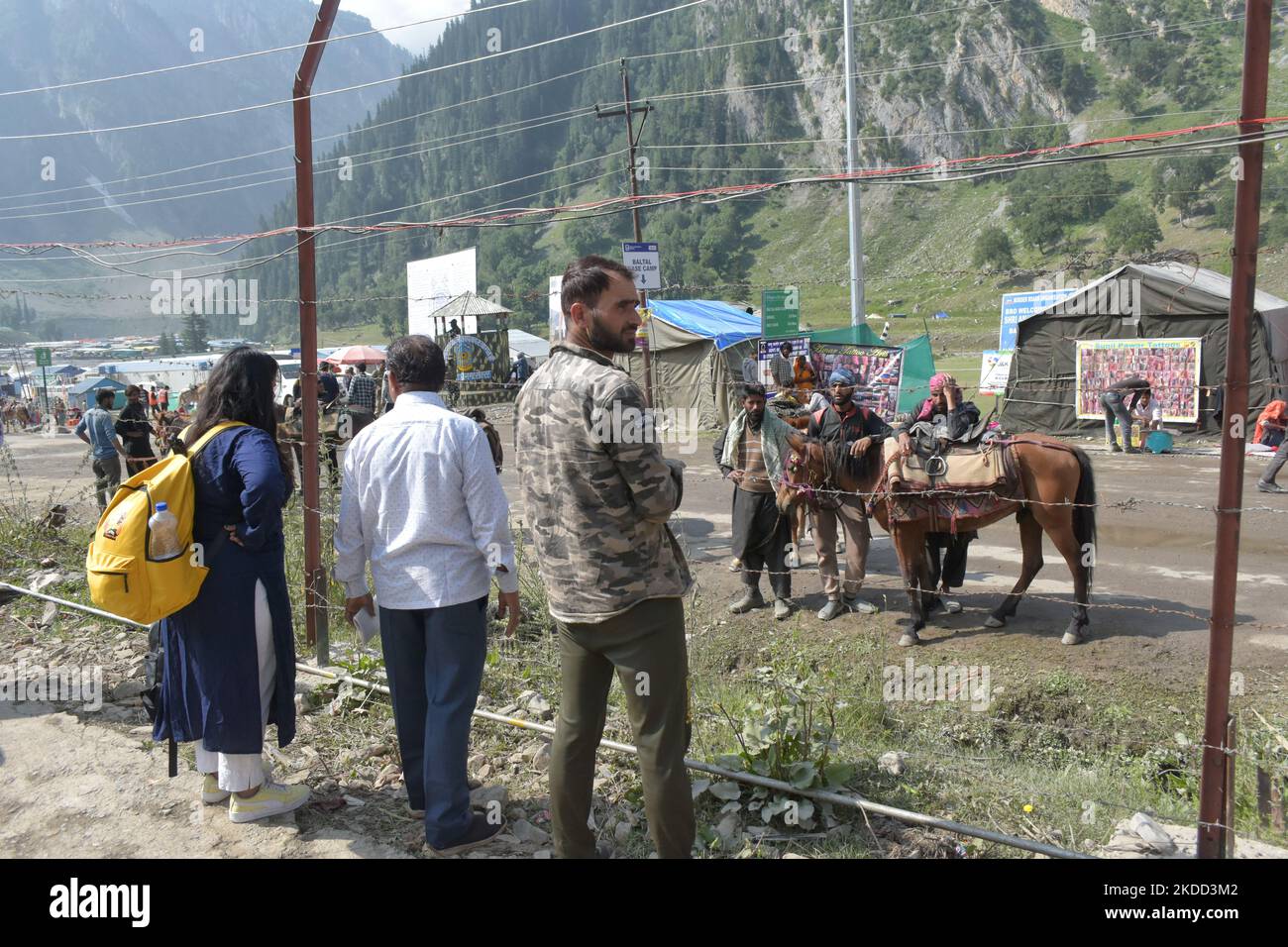 Hindu pilgrims walk toward the Amarnath cave during the yearly ...