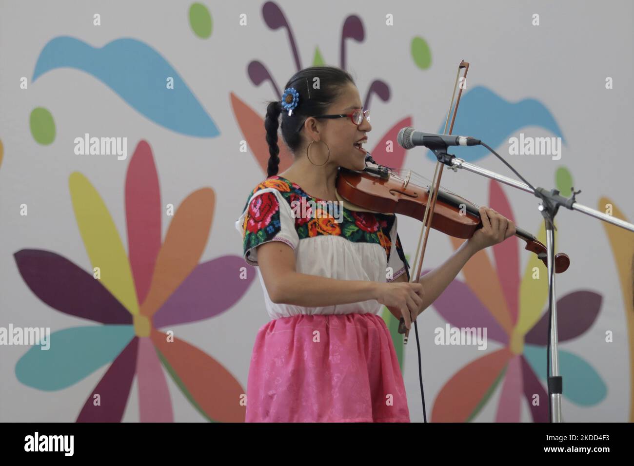 A woman plays a son huasteco (Mexican folk music) during the ...