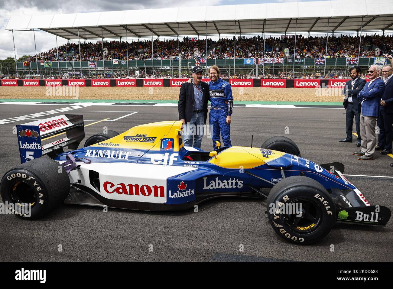 Sebastian Vettel with the 1992 Williams FW14 and Nigel Mansell portrait ...