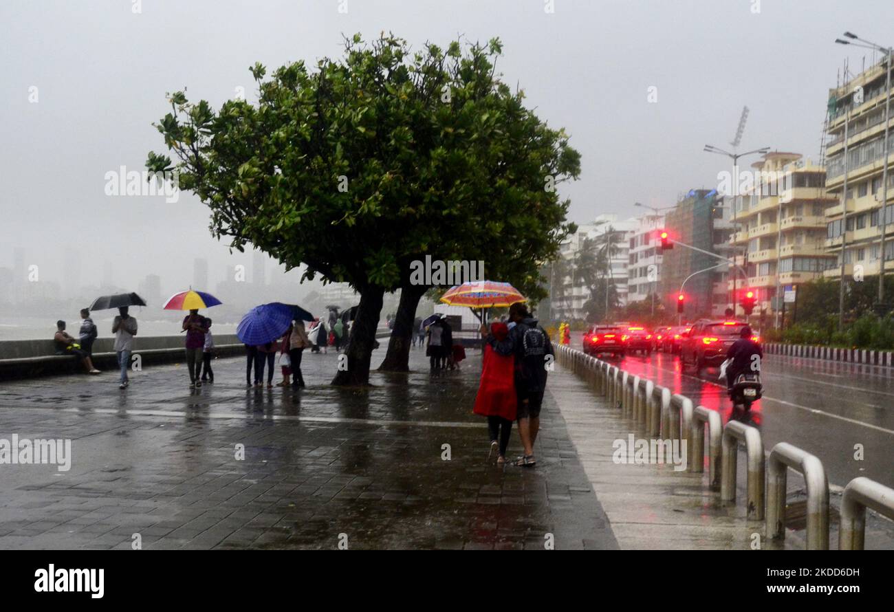 People spent time in Marine Drive during heavy rainfall in Mumbai ...