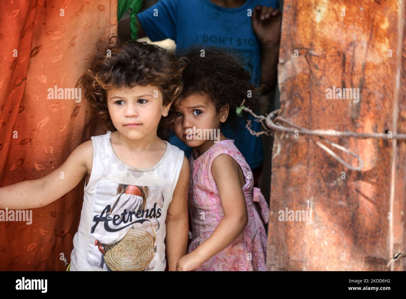 Palestinian children play inside their home in a poor neighborhood in ...