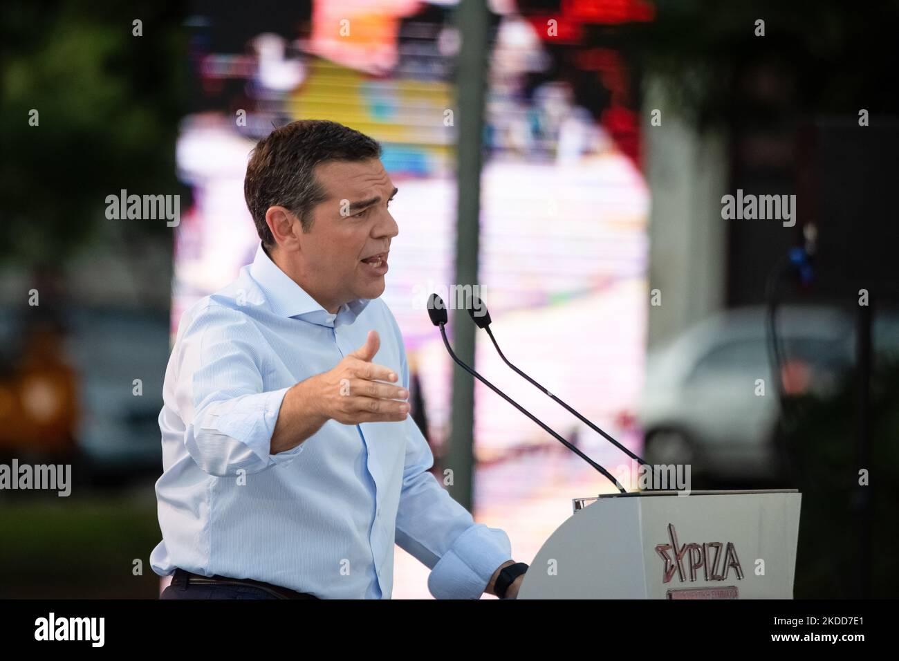 Alexis Tsipras is giving a speech about the program of SYRIZA for ...