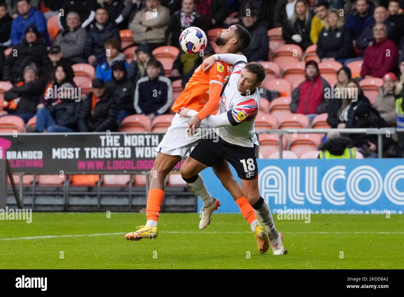 Jordan Clark #18 of Luton Town competes for the ball with CJ Hamilton ...
