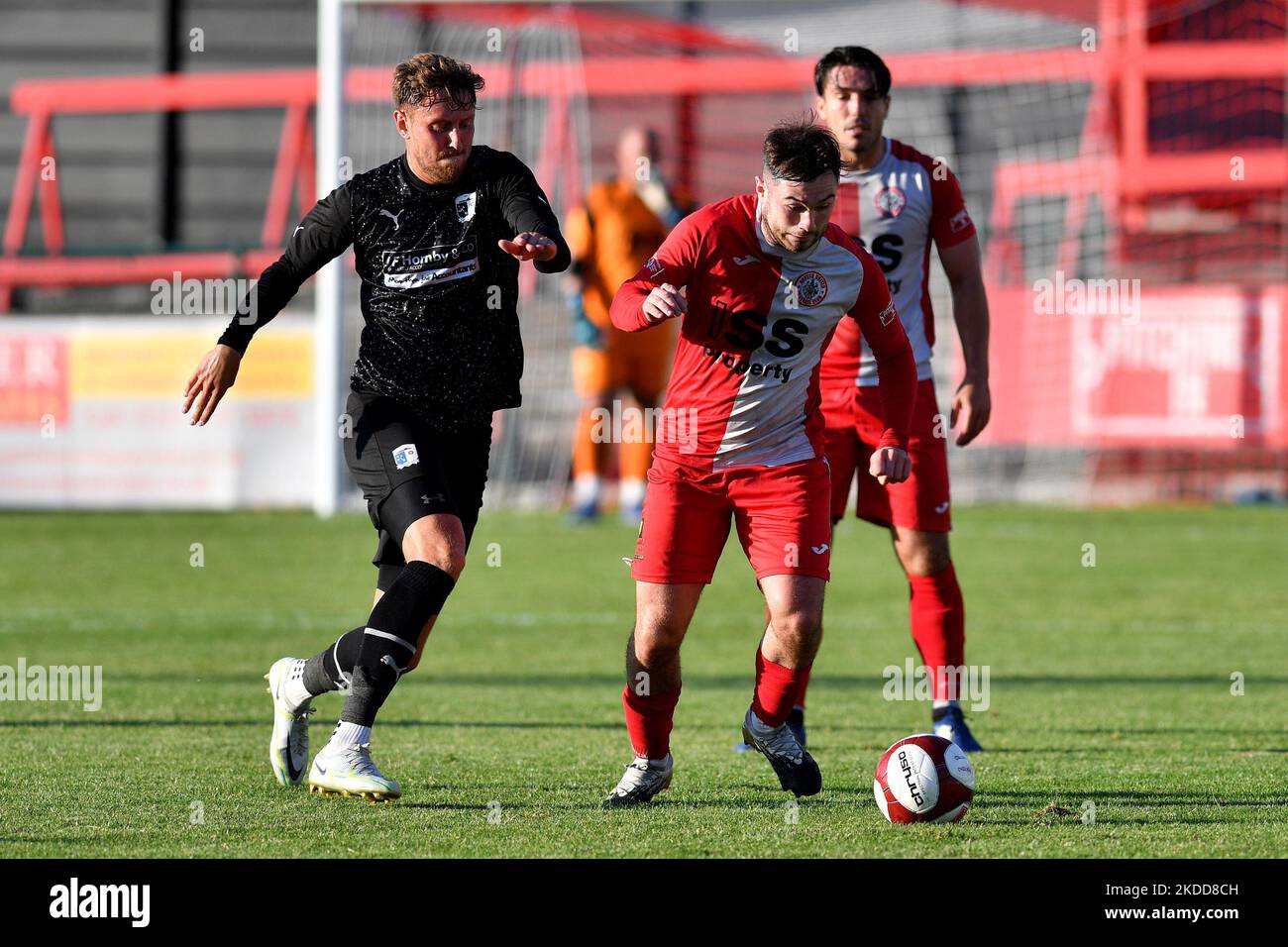 Barrow's Ritchie Bennett tussles with Ashton's Matty Regan during the ...