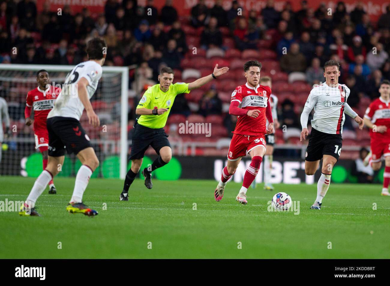 Middlesbrough's Hayden Hackney drives forward as the ref waves play on ...