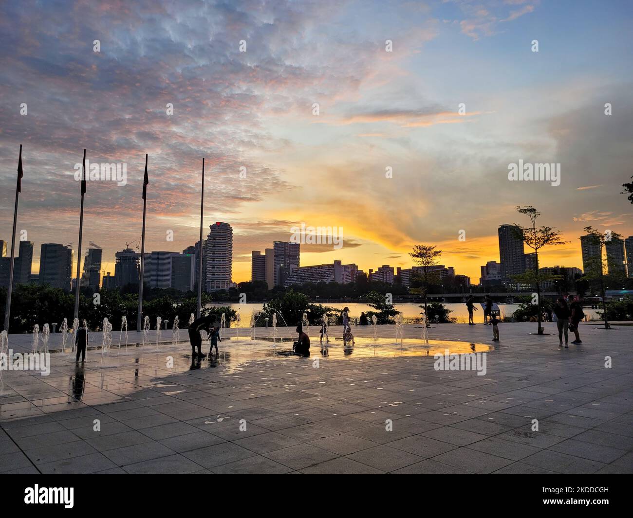 The children playing with fountains and families walking in Stadium ...