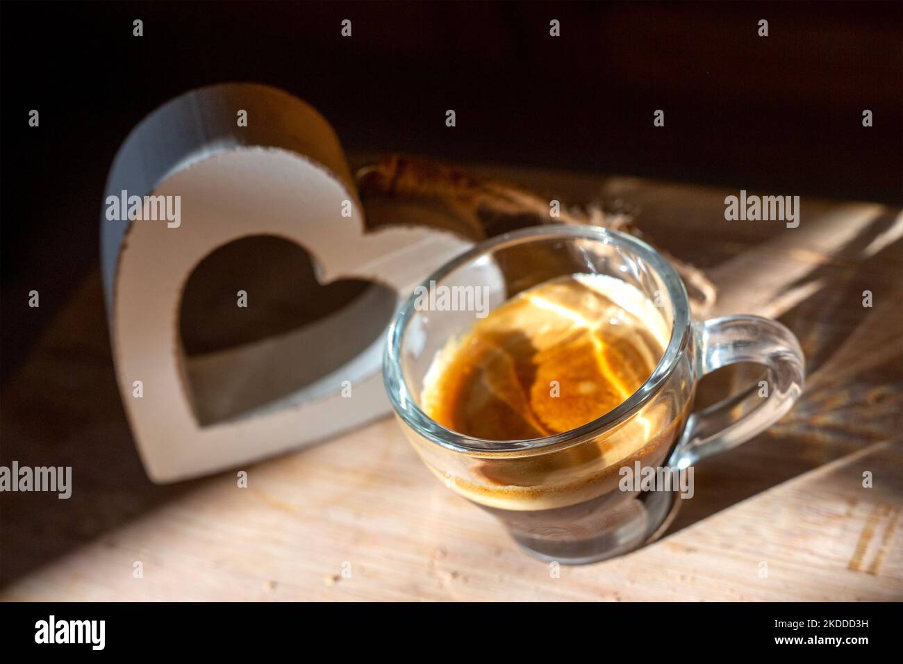 Top view to transparent coffee cup of italian espresso with wooden ...