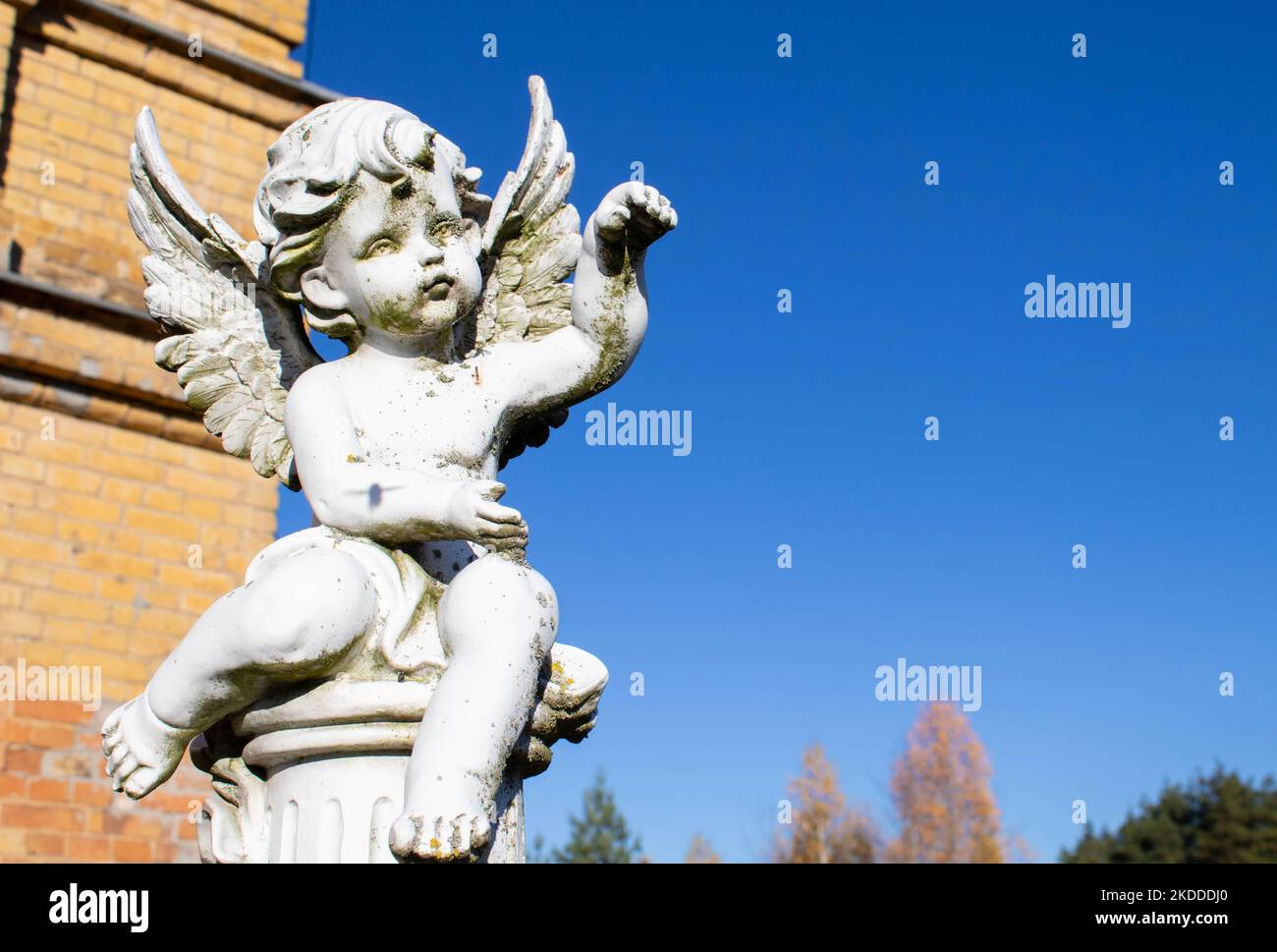 Cupid Statue decorated diecut on white background with path Stock Photo ...