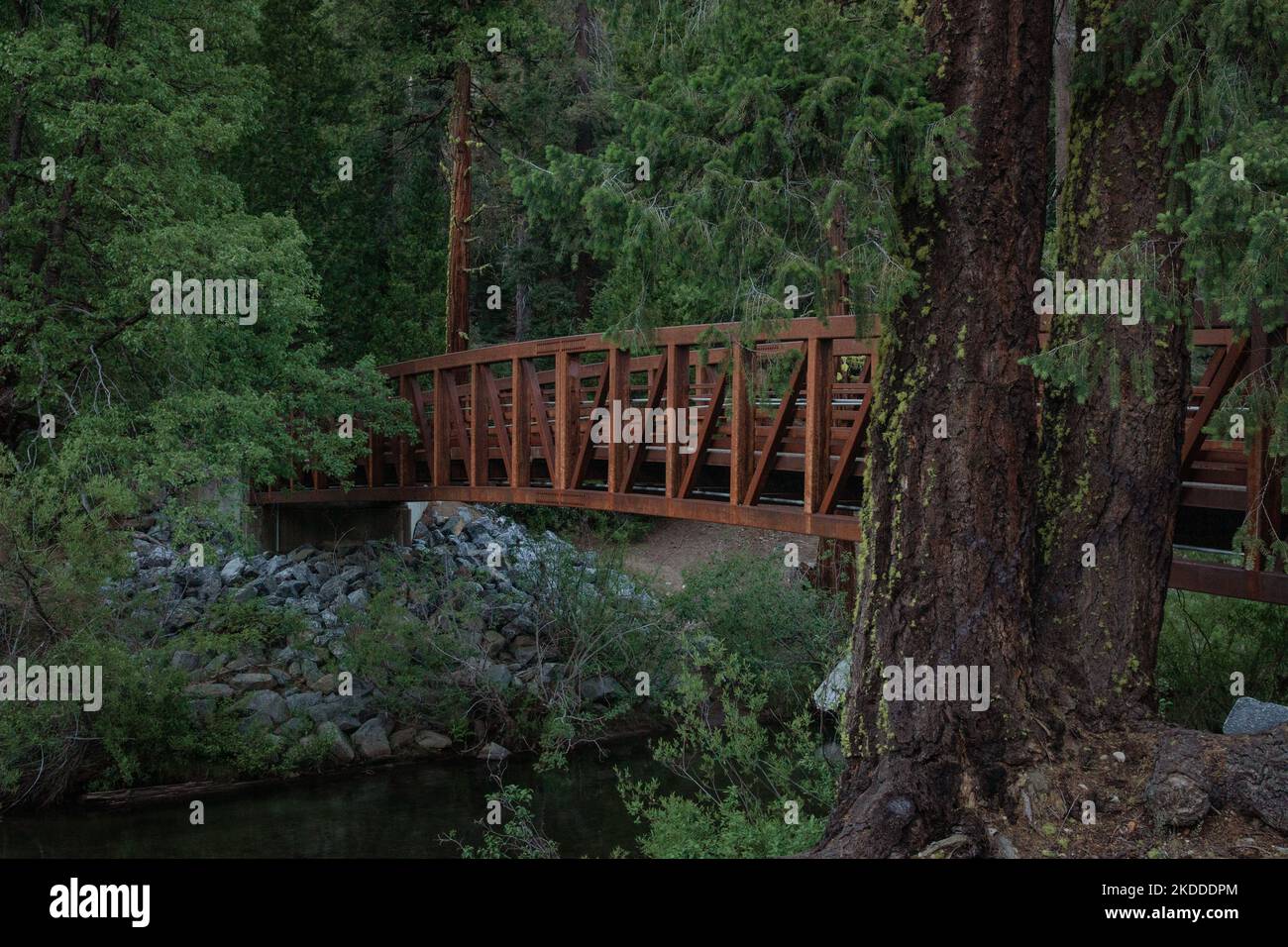 A rustic bridge over mountain stream Stock Photo - Alamy
