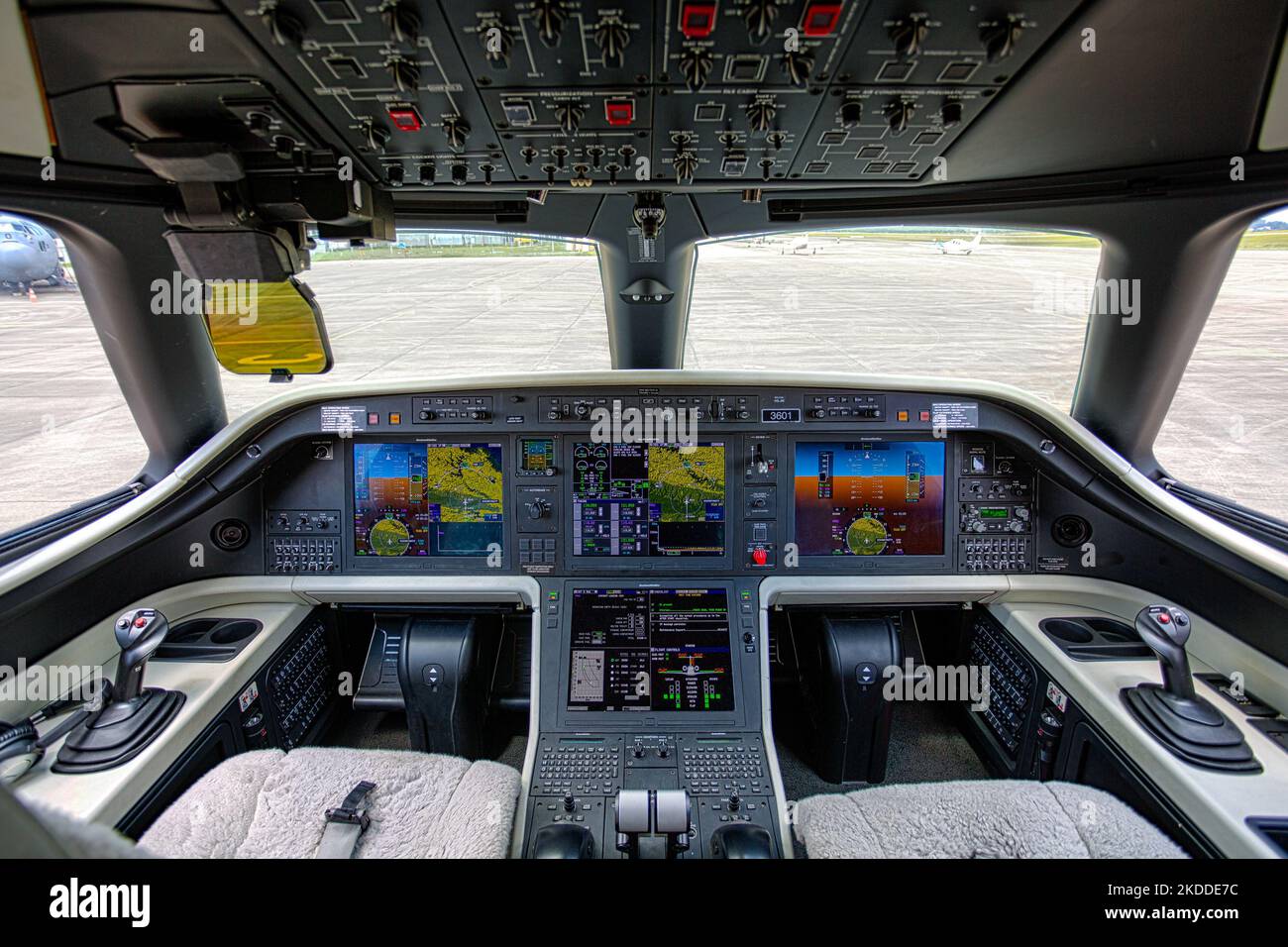 The flight deck of an executive airplane, wide angle, daylight, color ...