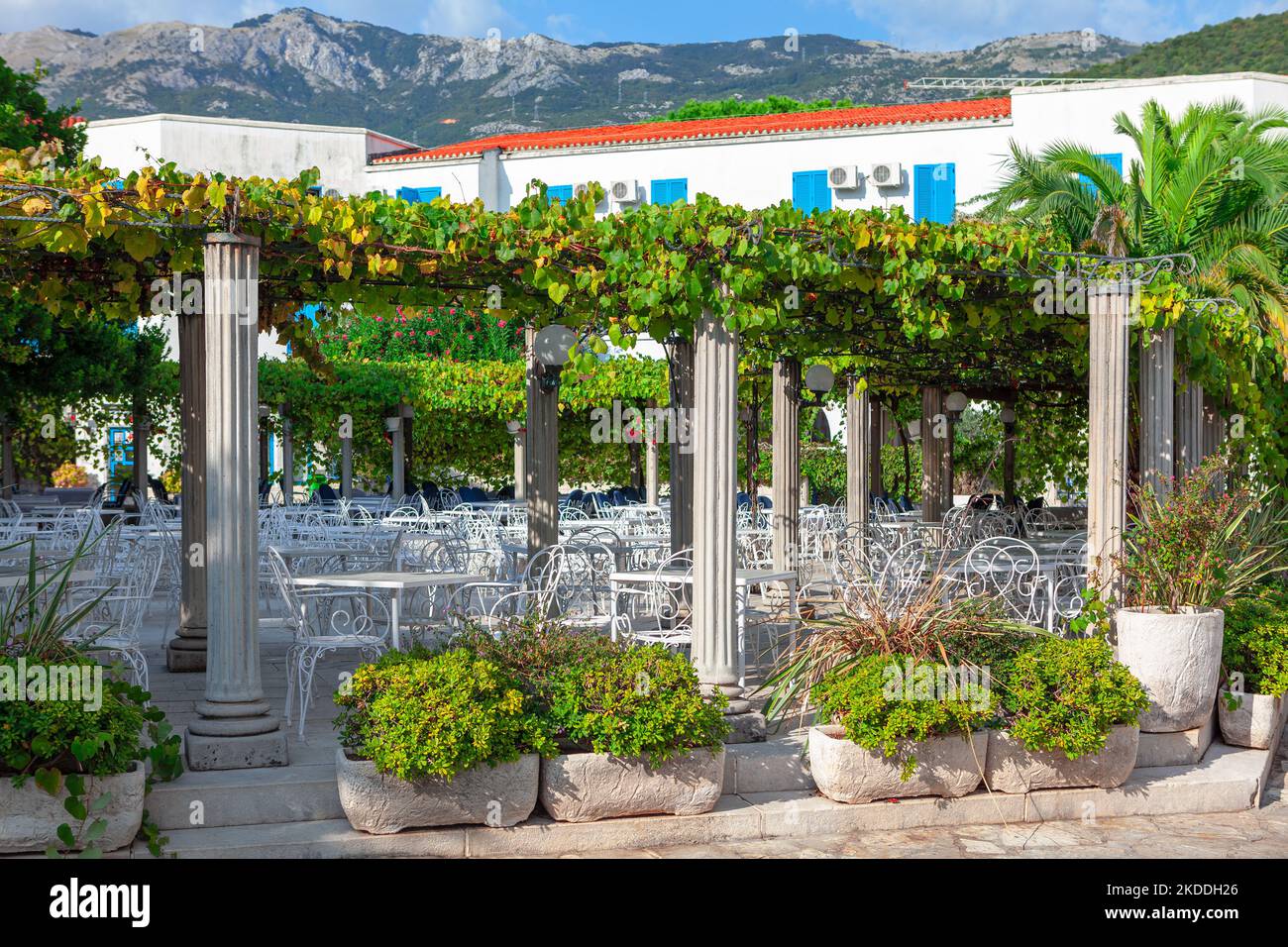 Outdoor restaurant with Greek columns . Tropical street terrace Stock ...