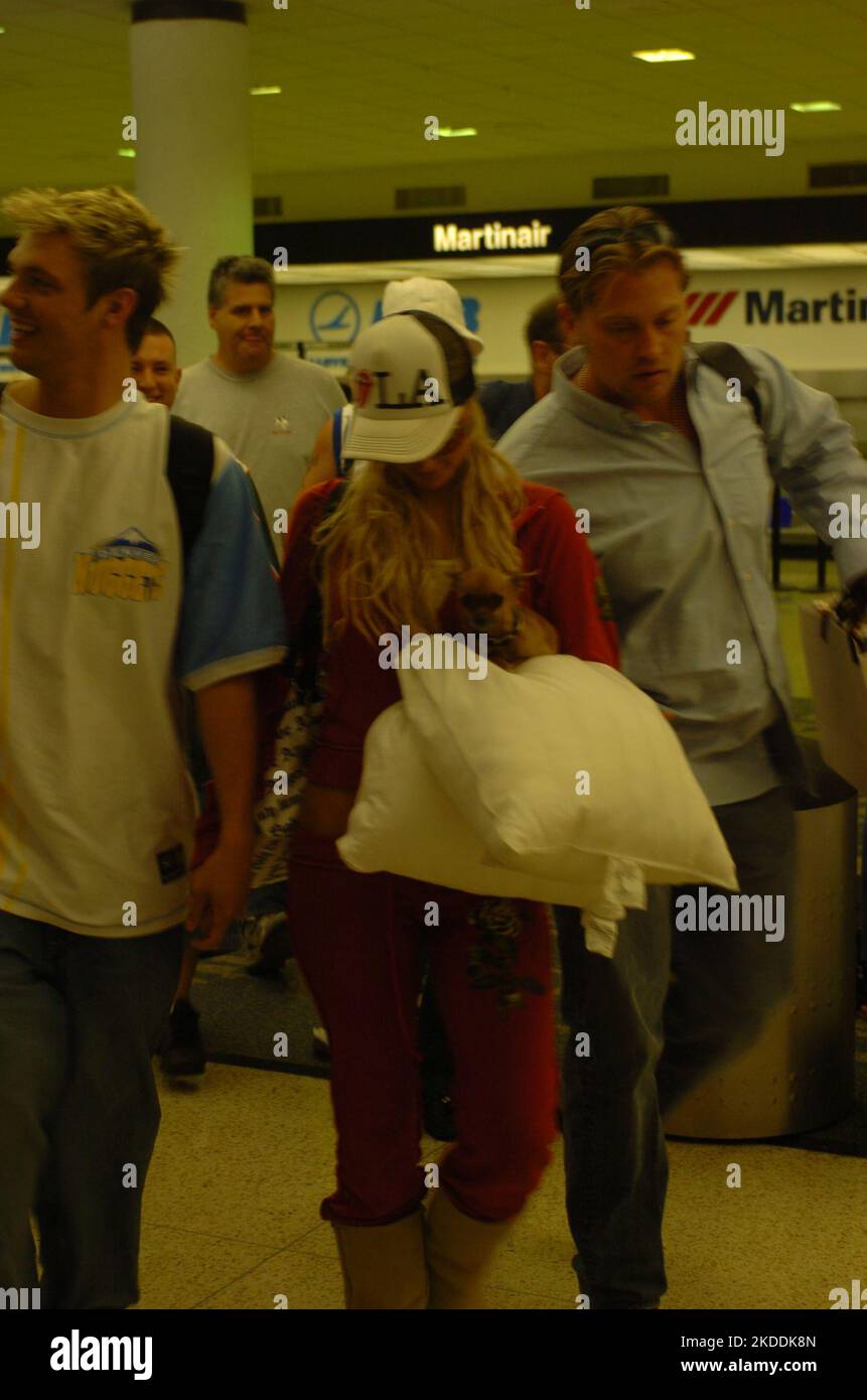 MIAMI, FL - 2004: Paris Hilton and her dog Tinker Bell along with ...